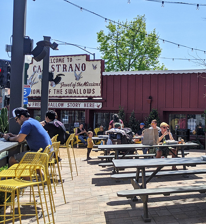 The outdoor patio – where strangers become friends united by the universal language of "mmmmm" and "oh my god, try this."