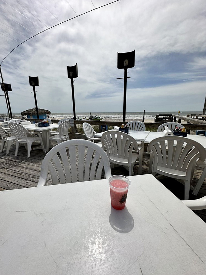 A strawberry daiquiri on the deck with nothing but Gulf views ahead&mdash;some moments are worth driving hours for.
