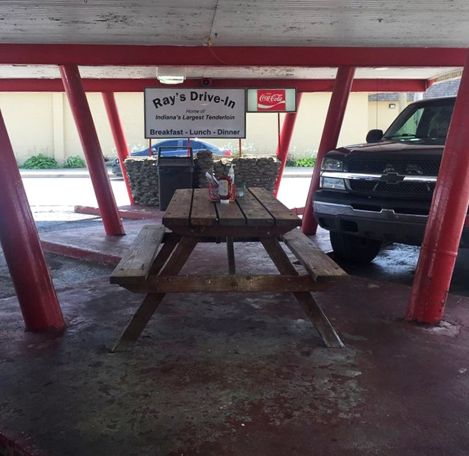 The outdoor seating area where "carhop service begins at 10am." A time capsule of American dining that still delivers.