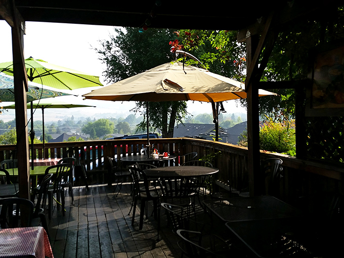 The outdoor deck at The Breadboard offers the kind of seating that turns "just grabbing breakfast" into "let's linger for another hour."