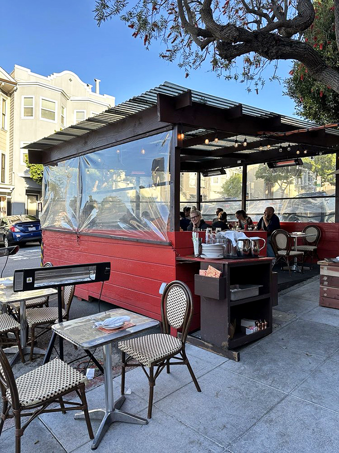 Outdoor dining that makes fog feel like ambiance. This cozy parklet turns sidewalk dining into an intimate experience worthy of lingering over one more glass.