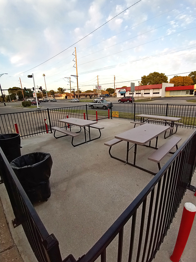 Sunset dining al fresco, Kansas-style. These picnic tables have witnessed countless "mmms" and "wows" as diners discover seafood paradise.