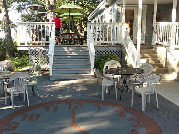 The outdoor seating area features an actual clock face built into the deck&mdash;because at the 5 O'Clock Club, it's always time for another round.