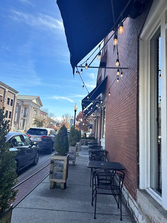 Sidewalk seating under string lights where Franklin's charm meets al fresco dining. Even the air tastes better with a side of people-watching.