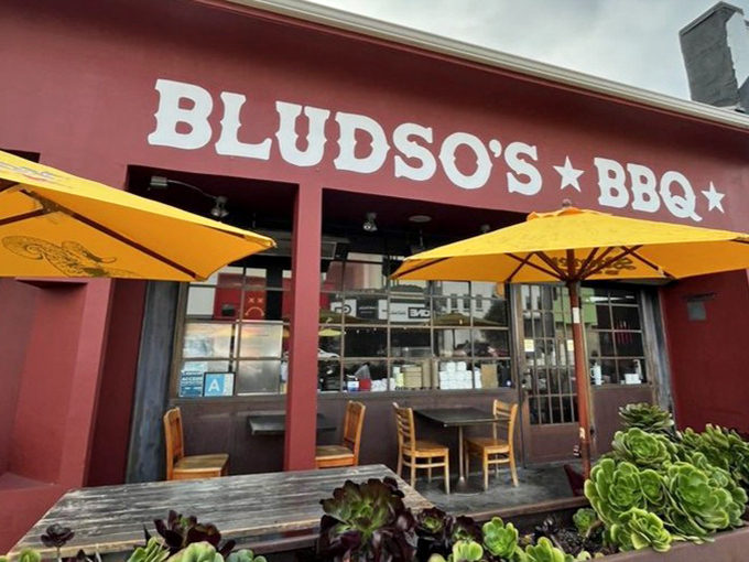 The outdoor seating area, where yellow umbrellas provide shade while you contemplate ordering seconds or maybe even thirds.