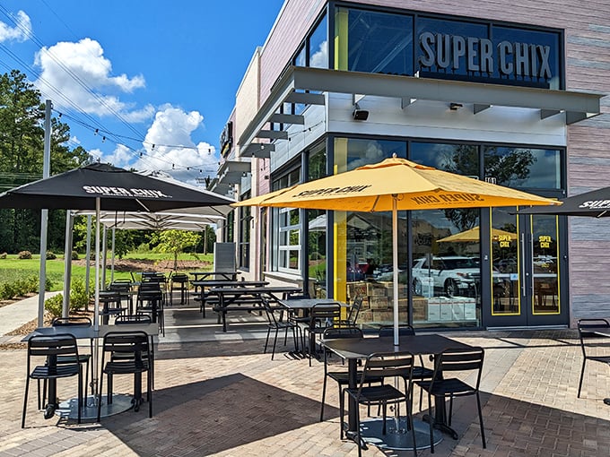 The outdoor patio at Super Chix offers the perfect setting for enjoying your chicken feast while pretending you're a civilized human who doesn't want to lick the plate.