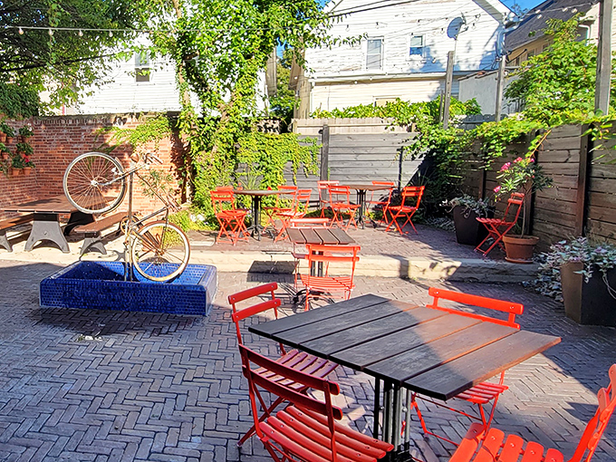 The outdoor patio feels like stumbling into a secret garden party where the dress code is casual and the conversation flows as easily as the wine.