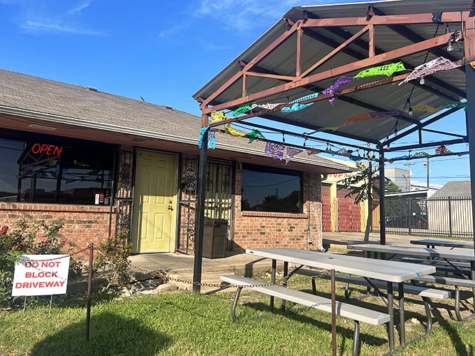 The covered patio offers al fresco dining with a side of Texas sunshine, perfect for those "too nice to be inside" days.