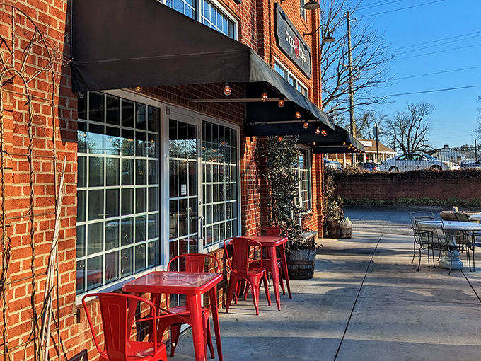 Those red stools outside are basically front-row seats to Watkinsville's main street theater.