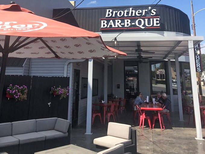 Outdoor dining under umbrellas turns a great meal into a perfect afternoon in downtown Madisonville's friendly atmosphere.