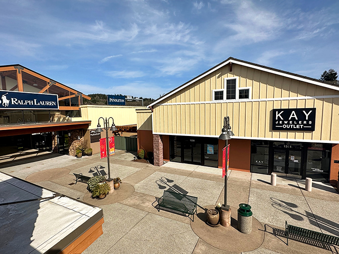 A bird's-eye view of retail therapy at its finest, with benches strategically placed for partners who've reached their shopping threshold.