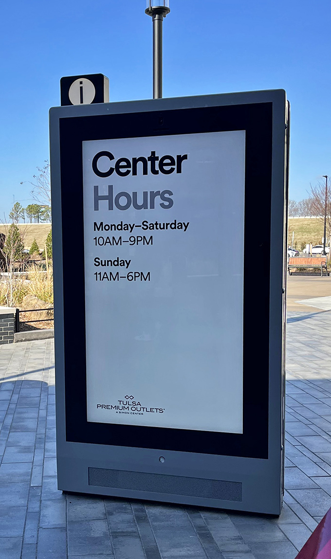 The hours sign reveals the sacred shopping window—Monday through Saturday until 9pm gives you plenty of time to justify those "just browsing" intentions.