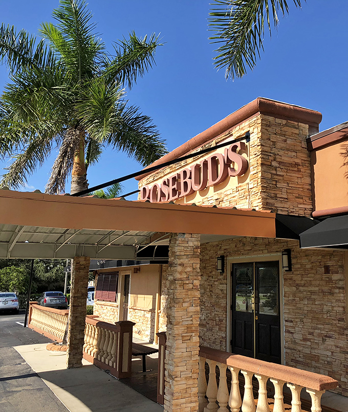 Morning sunshine bathes the entrance in golden light. Those palm trees aren't just landscaping&mdash;they're nature's way of saying "vacation starts here."