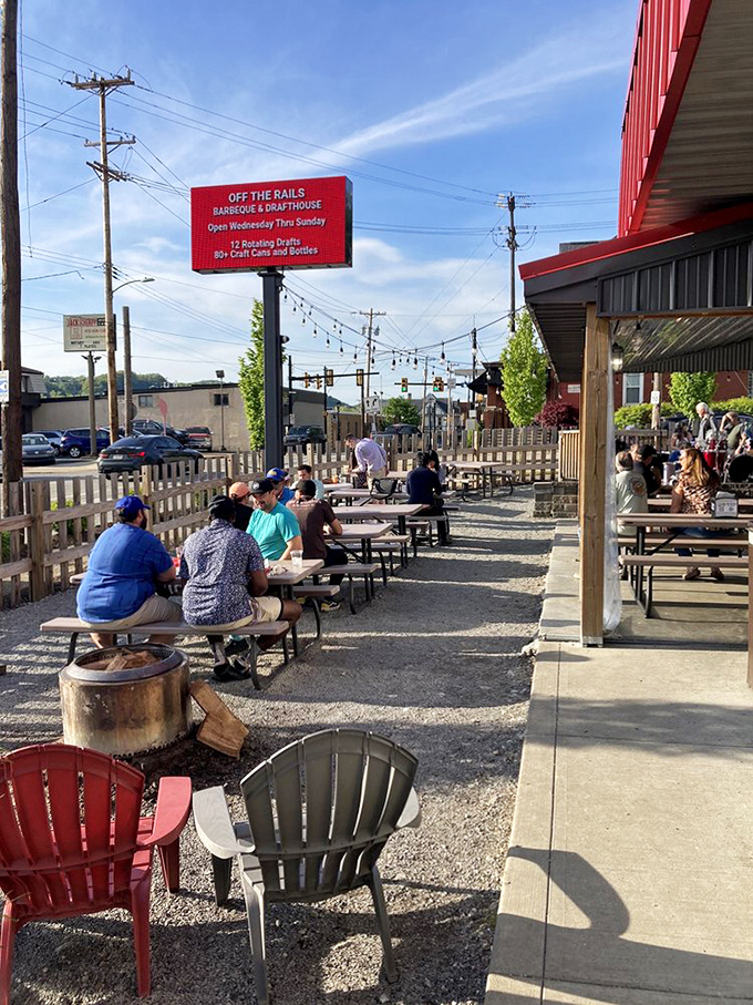 The sign says it all: 12 rotating drafts and 80+ craft cans and bottles, because proper barbecue deserves proper beverage respect.