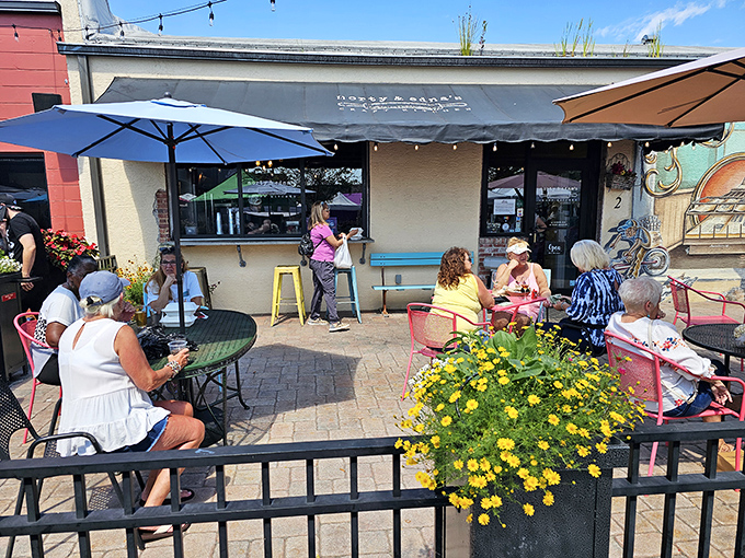 Florida dining at its most pleasant &ndash; sunshine, fresh air, and happy diners enjoying their meals under umbrellas on the cheerful patio.