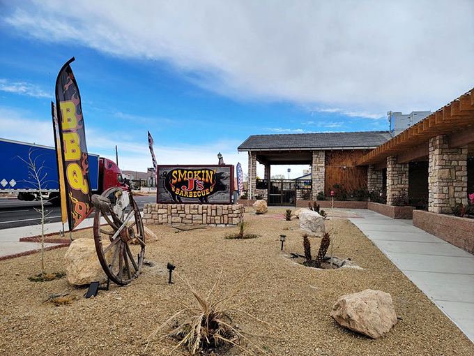 Desert landscaping meets barbecue branding in this entrance that says, "Yes, you've found the place your taste buds have been dreaming about."