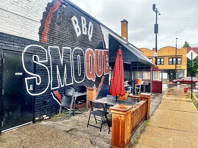 The side patio&mdash;where summer barbecue dreams come true under cheerful red umbrellas. Even the neighborhood seems happier here.