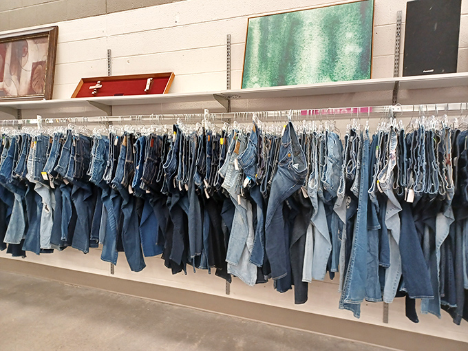 A wall of jeans hangs like a textile waterfall&mdash;each pair waiting for its perfect match.