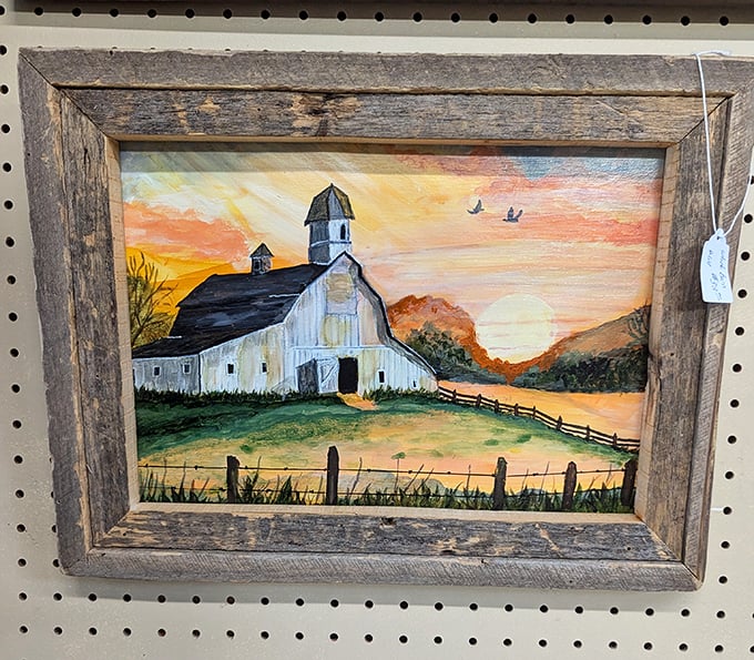 A rustic-framed farm painting that somehow matches every Kentucky home, regardless of decor. The sunset makes it art, not kitsch.