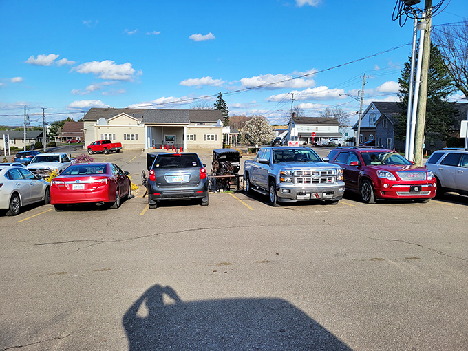 The parking lot tells the story—cars from different counties, one Amish buggy, all united by the universal language of incredible food.