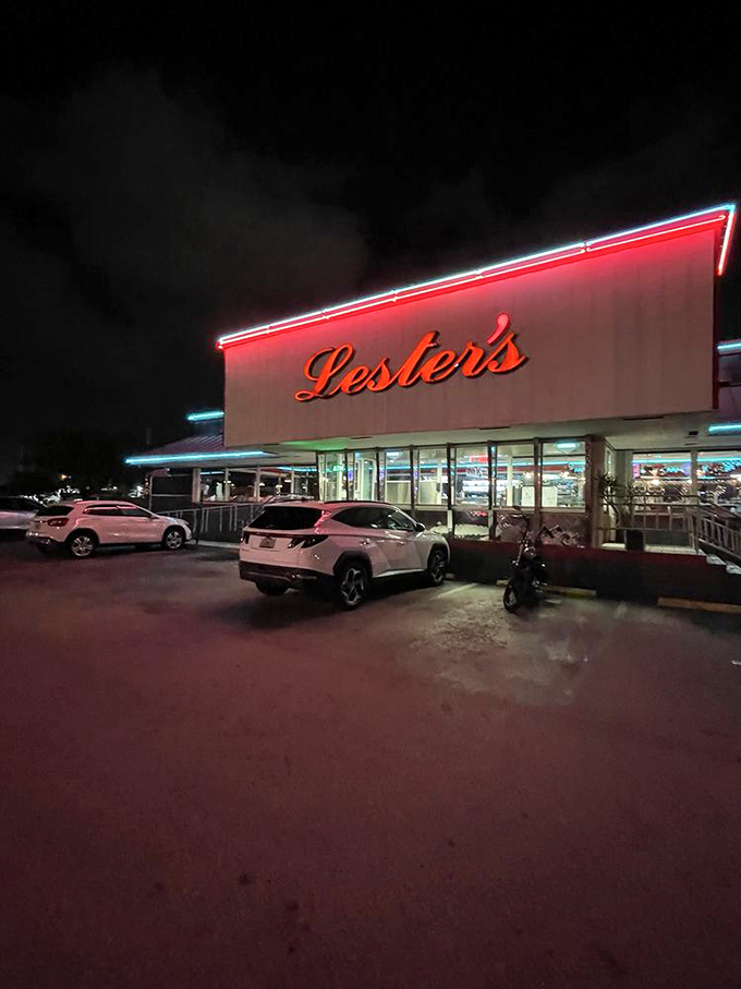 The evening glow transforms Lester's into a red-and-white beacon of hope for anyone wondering "What's for dinner tonight?"