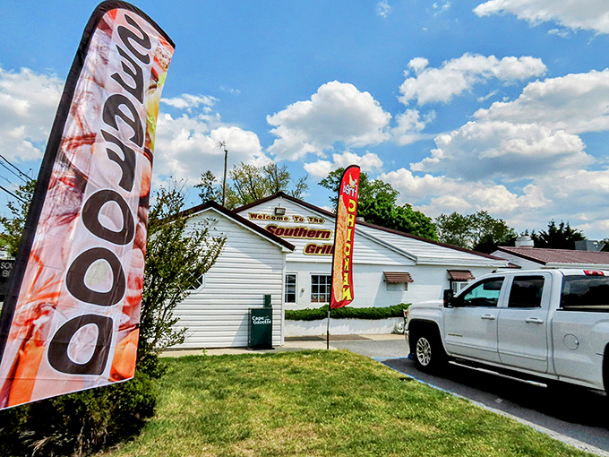 "SEAFOOD" flags wave like culinary battle standards, proudly announcing the restaurant's dedication to Delaware's aquatic bounty.