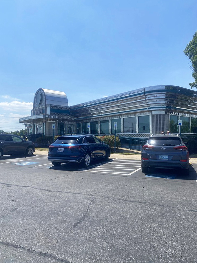 From the parking lot, Boulevard Diner's silver silhouette gleams like a chrome mirage, promising relief for hungry travelers and locals alike.