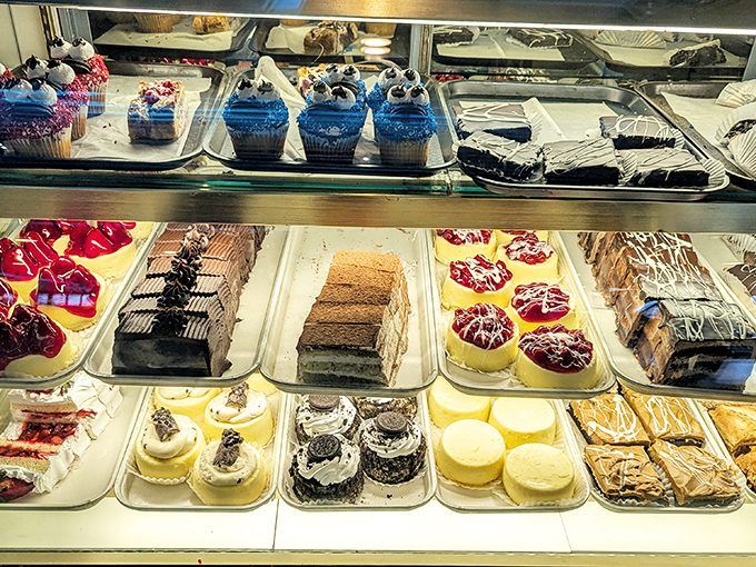 The dessert case&mdash;a glass-enclosed museum of temptation where willpower goes to die and "I'll just have coffee" turns into "and a slice of that."