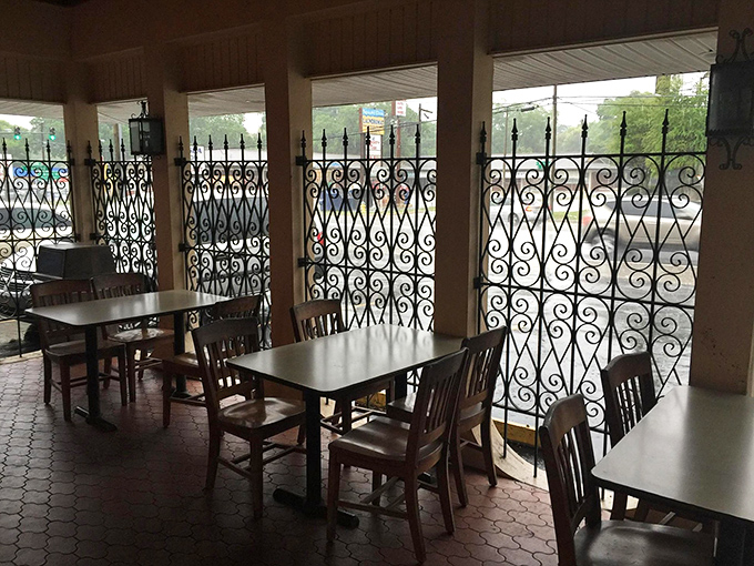 The patio dining area&mdash;where the Florida breeze complements your grouper sandwich like nature's own seasoning.