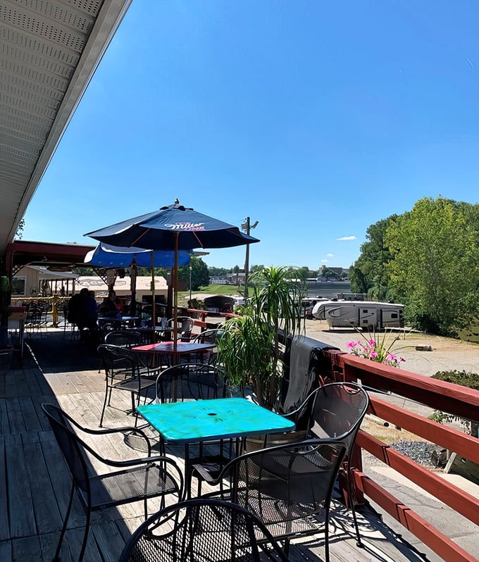 The outdoor patio offers fresh air, sunshine, and river views—nature's perfect accompaniment to their legendary fish dinners.
