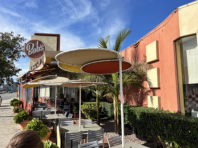 Outdoor dining California-style&mdash;where palm trees stand guard over your fries and sunshine is the best condiment money can't buy.