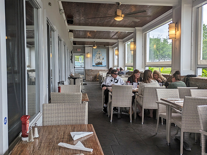 The screened patio offers al fresco dining without the seagulls eyeing your lobster roll—though they'd certainly understand the temptation.