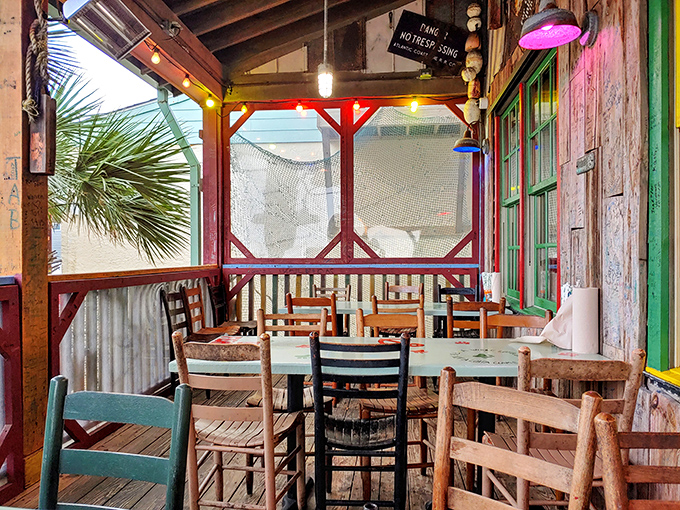 The screened porch offers ocean breezes without the sand in your shoes. Mismatched chairs just mean you're among friends, not at a board meeting.