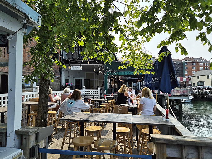 The outdoor deck offers the ultimate Portsmouth dining experience &ndash; fresh air, harbor views, and seafood that was swimming this morning.