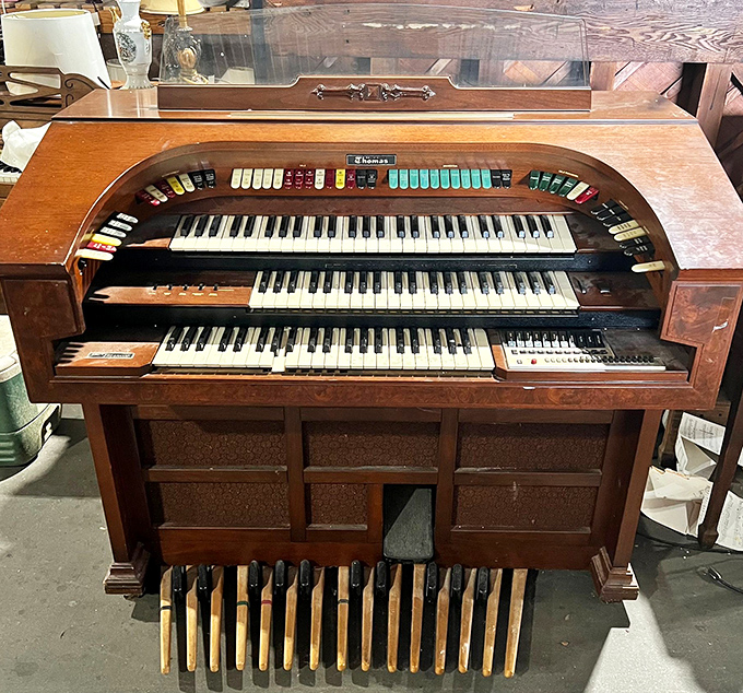 This vintage organ isn't just furniture; it's a time machine waiting for fingers to press its keys and transport everyone within earshot.