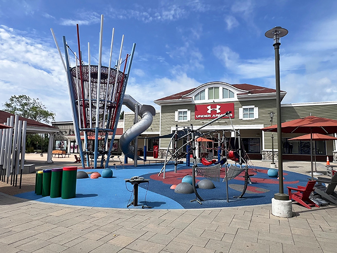A playground where kids can burn energy while parents debate whether they really need another pair of jeans.