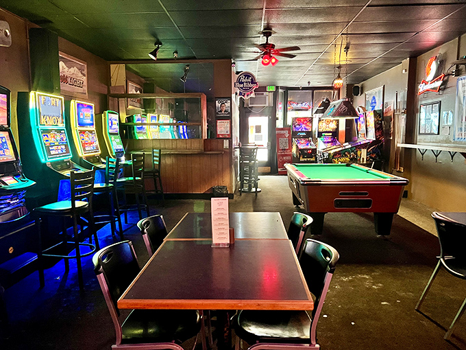 The game room&mdash;where video poker machines blink hopefully and the pool table waits patiently for your next move. This is where time slows down between bites.