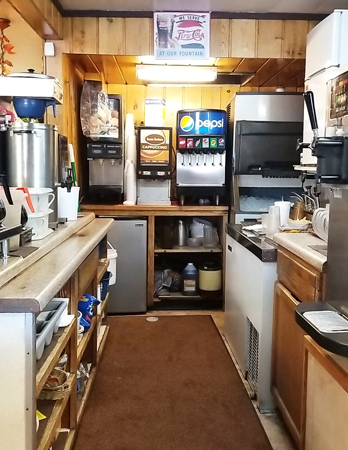 Behind the scenes in the compact kitchen where breakfast magic happens &ndash; efficiency in motion and decades of know-how packed into every square inch.