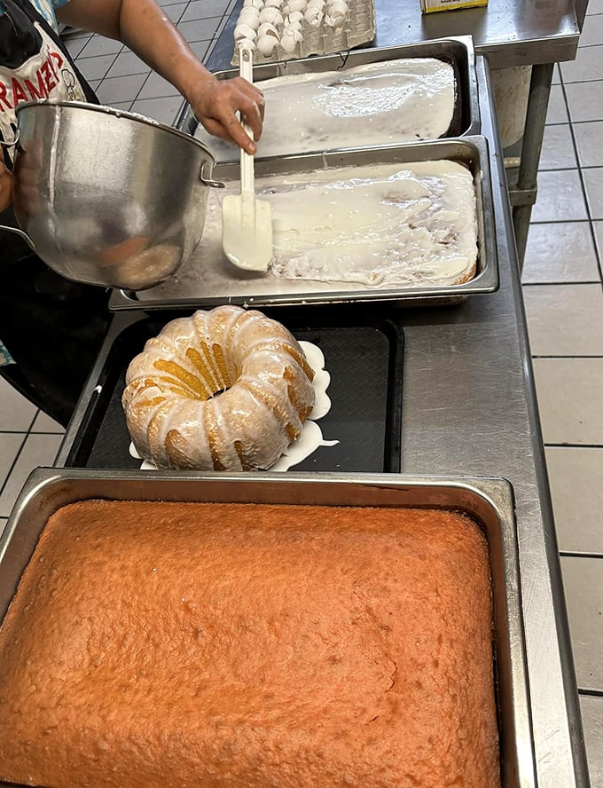 Fresh cakes being prepared – the behind-the-scenes magic that explains why grandma's recipes never quite match what you get here.