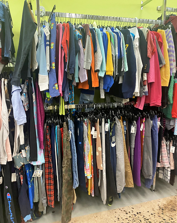 The children's clothing section: a rainbow explosion proving kids grow faster than parents' ability to keep up with changing sizes.