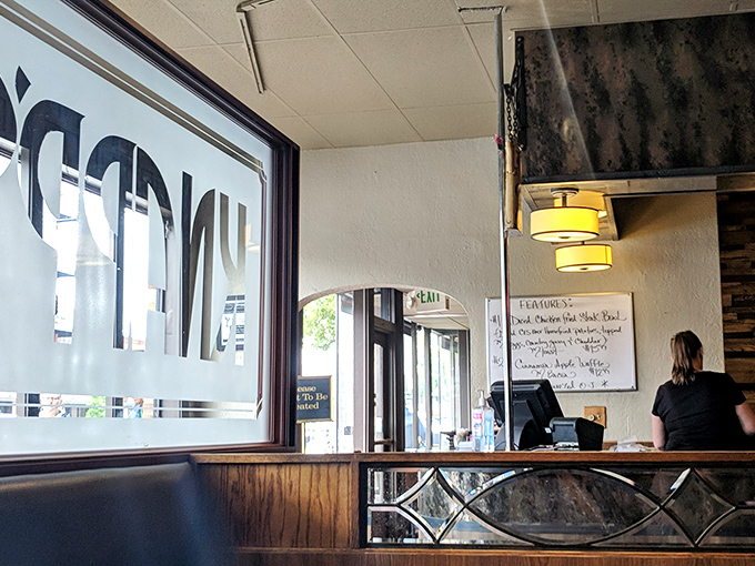 The host station&mdash;first point of contact in your breakfast adventure, where the promise of coffee and pancakes is just moments away.