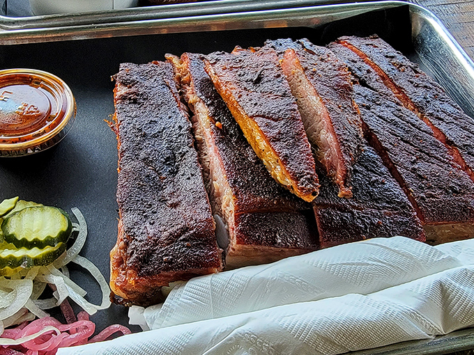 Ribs with that perfect bark, lined up like soldiers ready for delicious battle. The pickled onions provide a welcome acid counterpoint.