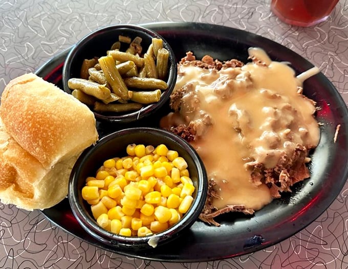 Gravy isn't just a condiment here&mdash;it's a commitment. This open-faced roast beef sandwich doesn't know the meaning of restraint.