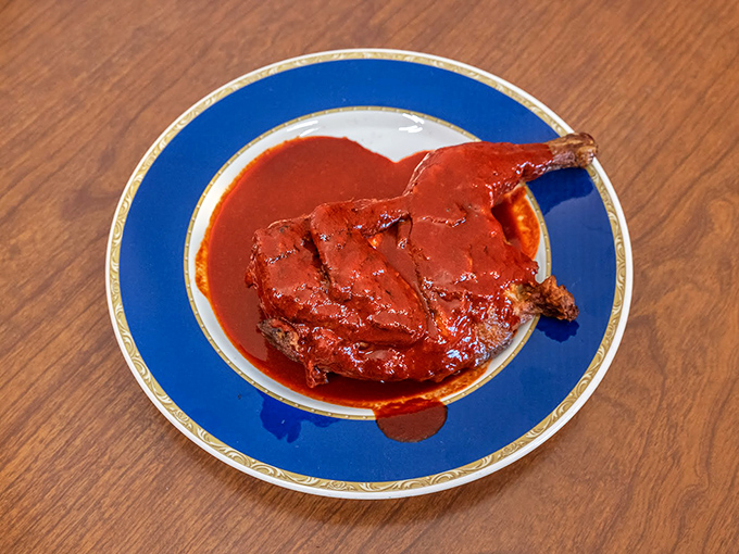 Barbecued chicken swimming in that signature sauce &ndash; proof that Parks doesn't play favorites between pork, beef, or poultry.