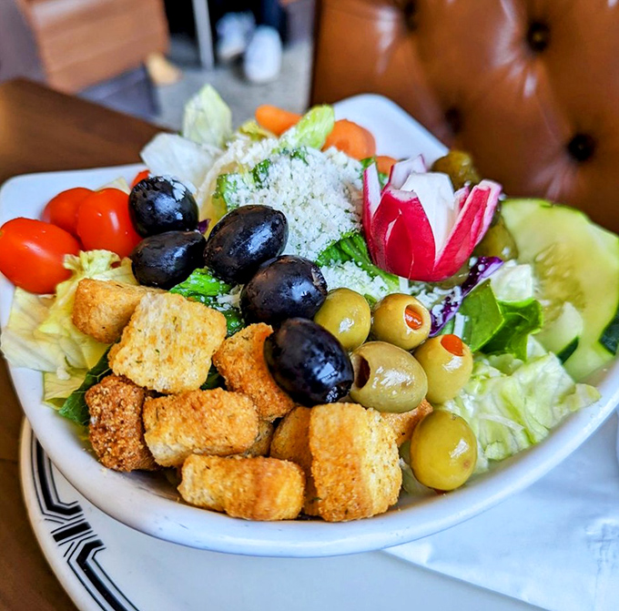 A deli salad that somehow makes vegetables feel like they're not just invited to the party, but actually belong there.