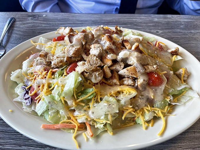 A chicken salad that proves vegetables can be exciting when they're merely the supporting cast for perfectly seasoned protein and sharp cheddar.