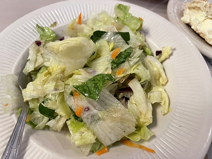 The house salad&mdash;crisp, bright, and palate-cleansing&mdash;the unsung hero preparing you for the pasta marathon ahead.