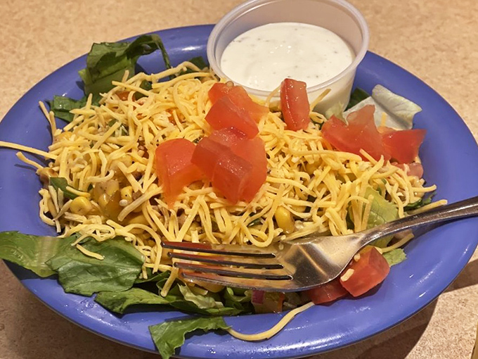 This isn't just a side salad&mdash;it's what you eat to convince yourself that ordering three hot dogs was a balanced dietary decision.