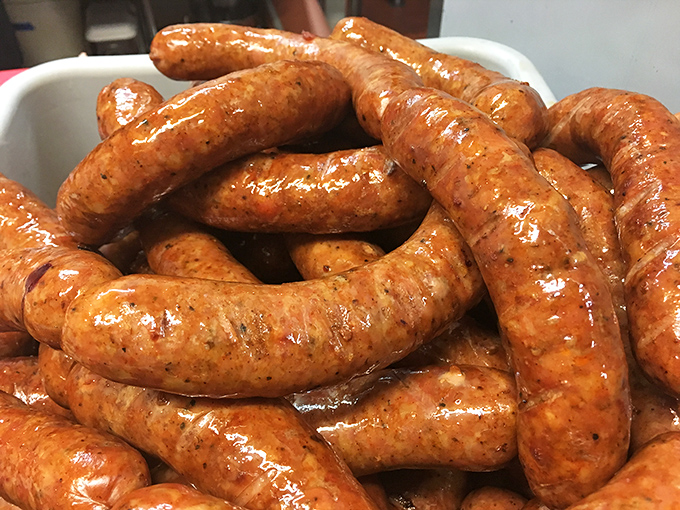 These sausages aren't just links &ndash; they're glistening promises of juicy, spiced perfection waiting to join your barbecue spread.