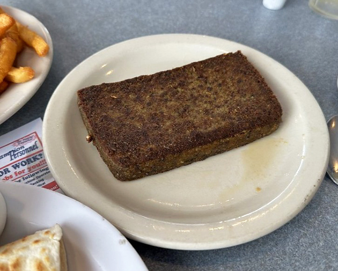 Scrapple &ndash; that mysterious Pennsylvania breakfast tradition that turns skeptics into believers with one perfectly crisped slice.